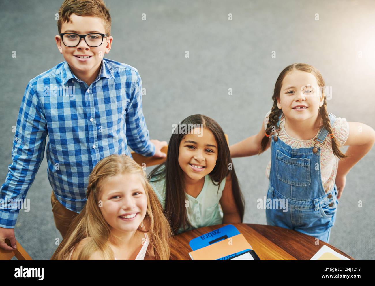 We are the smart kids. High angle shot of a group of cheerful young ...