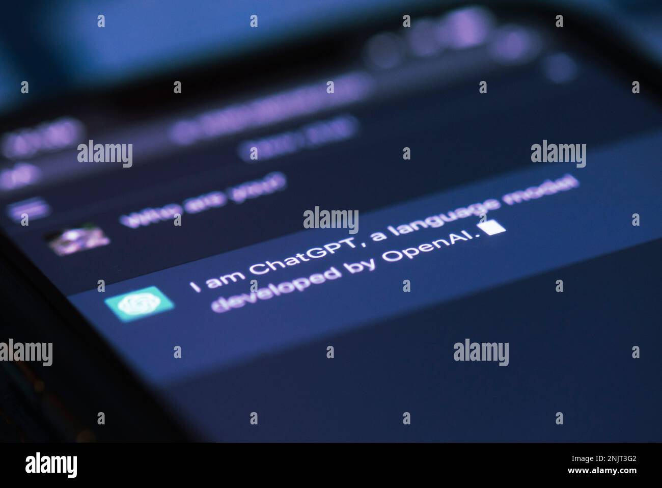 In this photo illustration, a person browses ChatGPT, a chatbot ...
