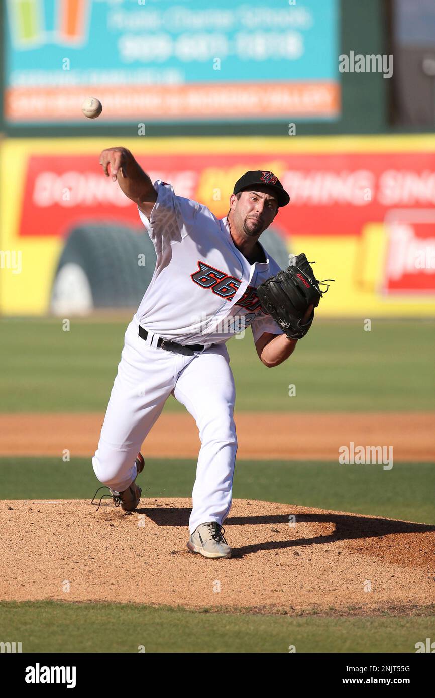 Chase Chaney (25) of the Inland Empire 66ers pitches against the ...
