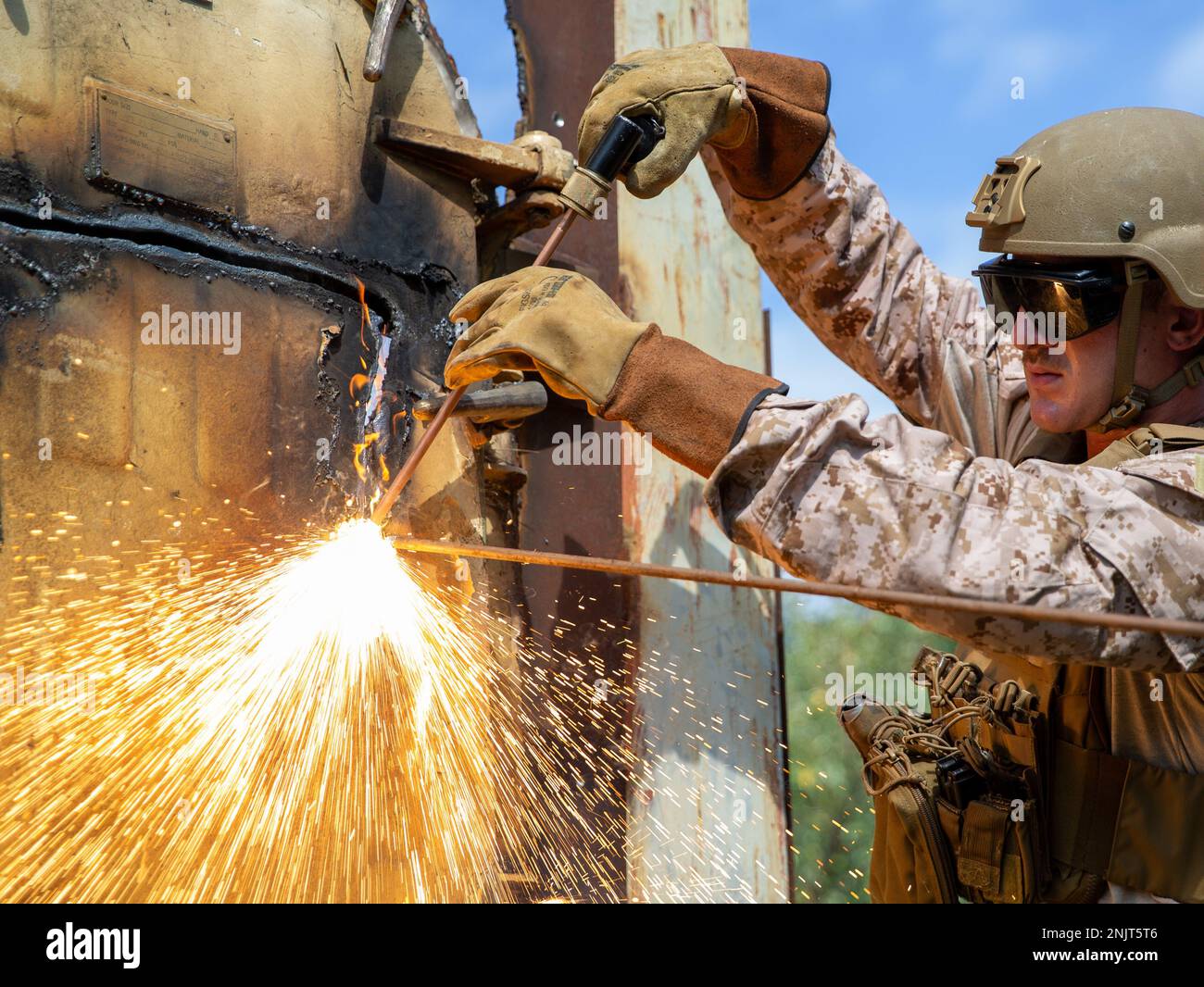 U.S. Marines and airmen attached to the Method of Entry School, Weapons ...
