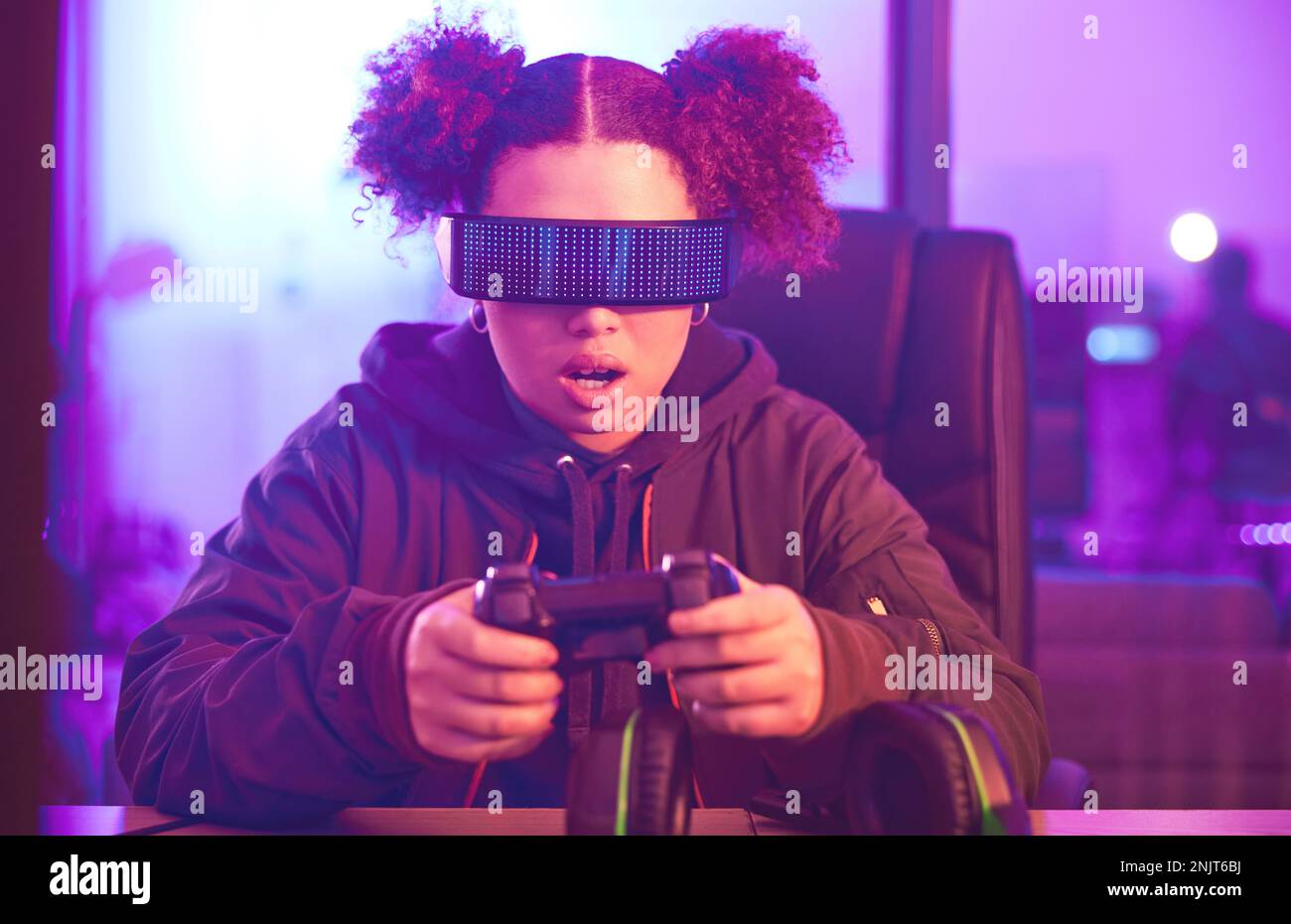 Night, virtual reality and gaming girl with joystick, innovation and vr ...