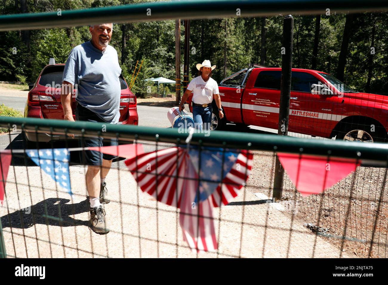 Len Ramirez of Ramirez Rattlesnake Removal arrives at the home of Eric ...
