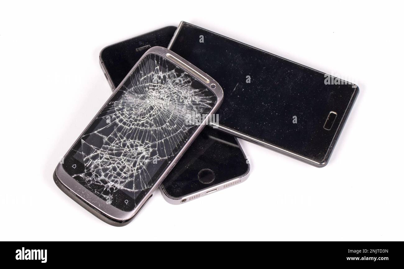 Broken display screen smartphone (stack) on a white background Stock ...