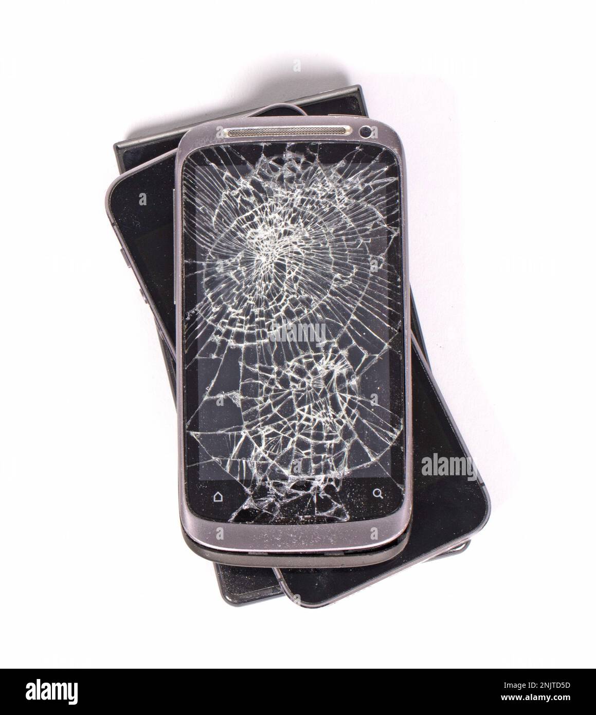 Broken display screen smartphone (stack) on a white background Stock ...