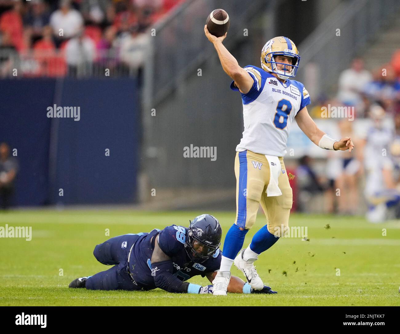 Winnipeg Blue Bombers quarterback Zach Collaros (8) passes under ...