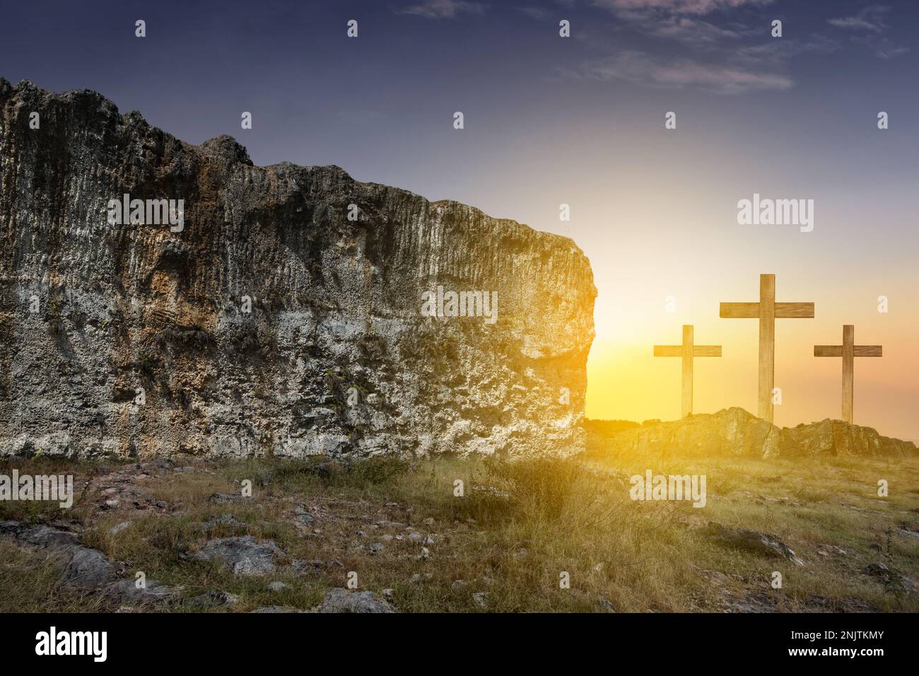 Christian Cross on the rock hill with sunset sky background Stock Photo ...