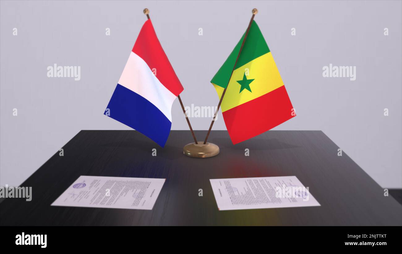 Senegal and France national flags on table in diplomatic conference ...