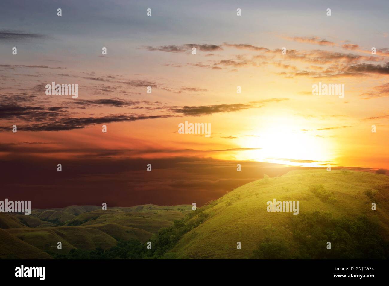 Green hills with landscape view with a sunset sky background Stock ...
