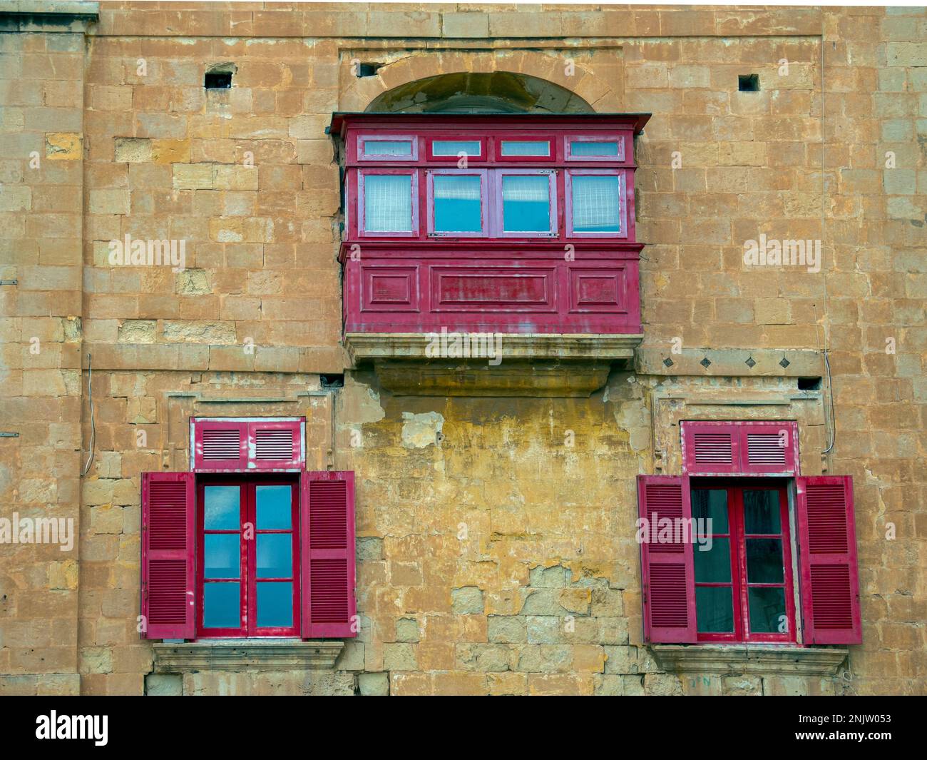 Fragment of the building's facade with traditional wooden ornate ...