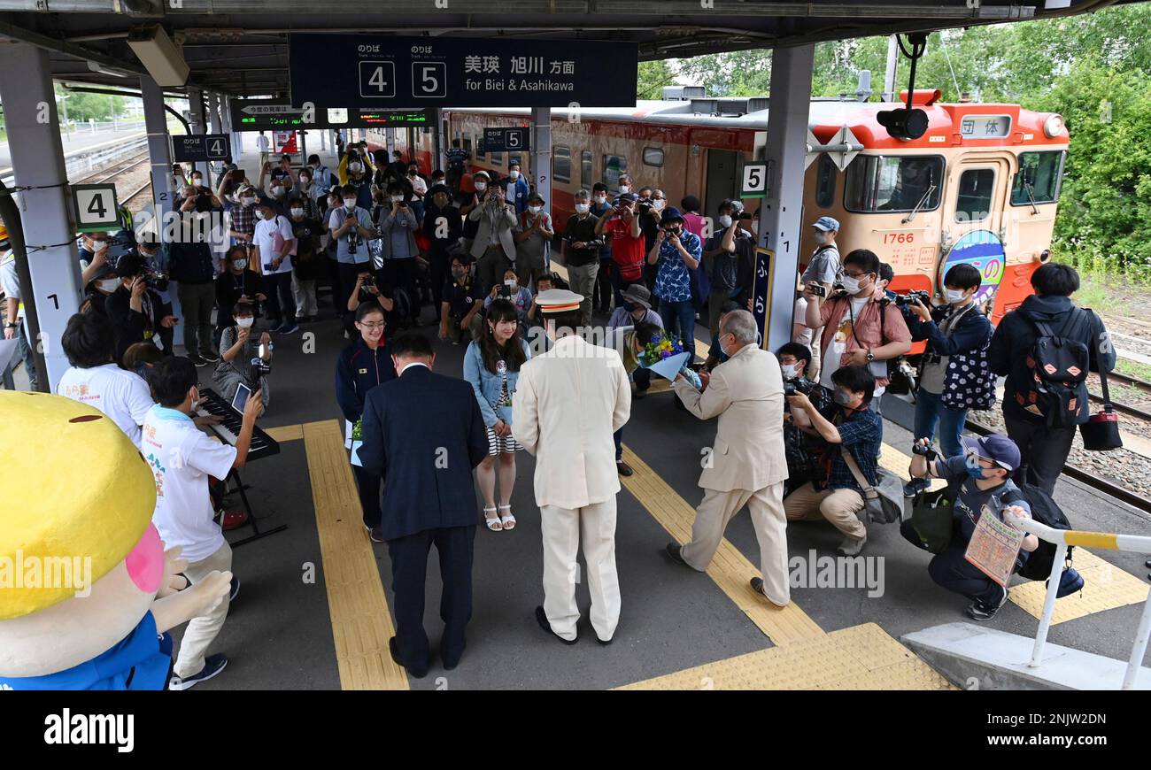 A Nemuro Line train of the KiHa 40 series is at Furano Station during ...