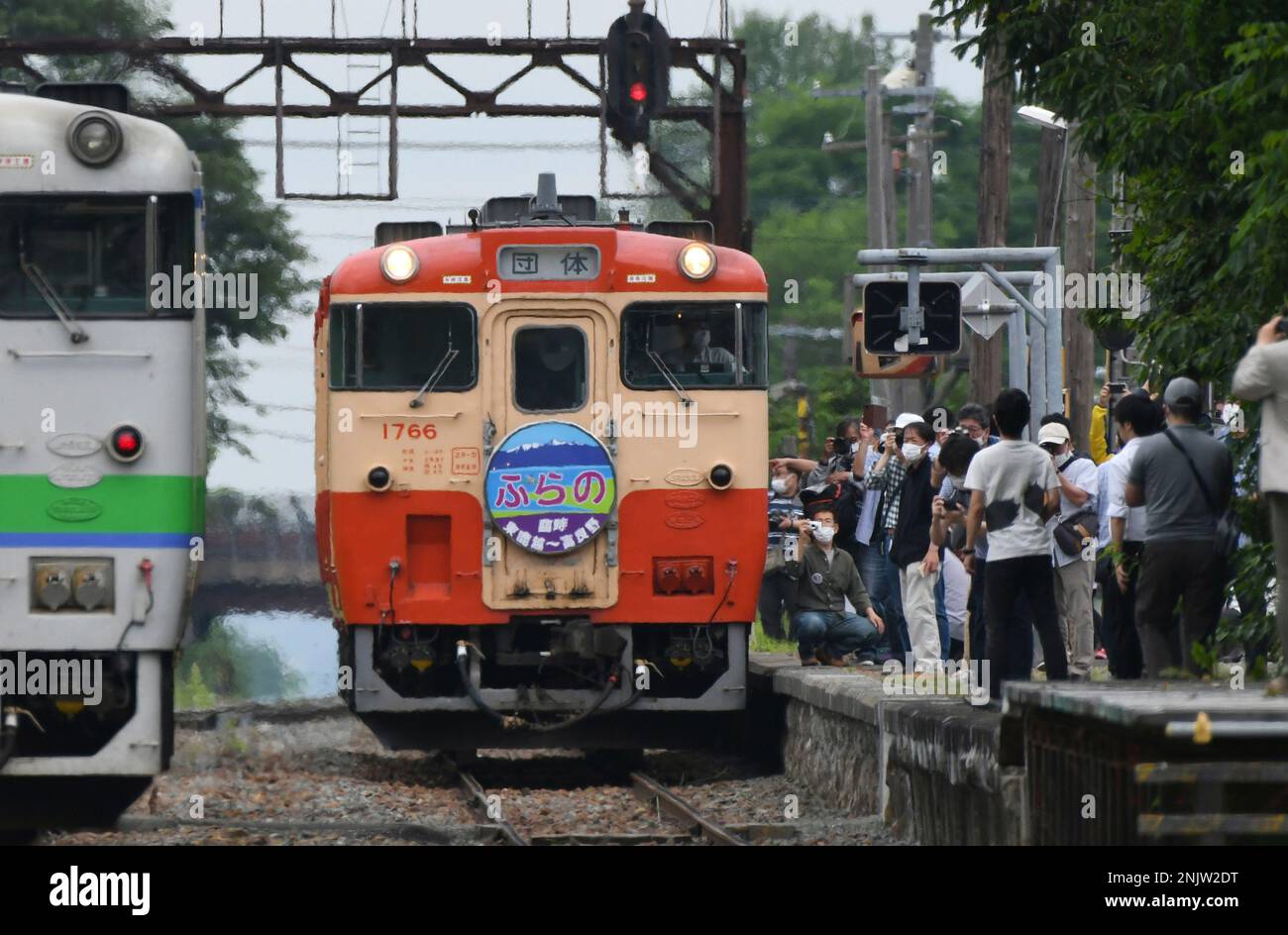 A Nemuro Line train of the KiHa 40 series is at Yamabe Station during ...