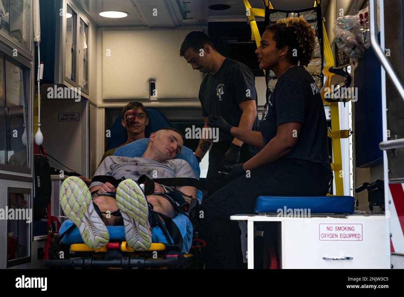 U.S. Air Force paramedics care for patients during a base-wide training ...