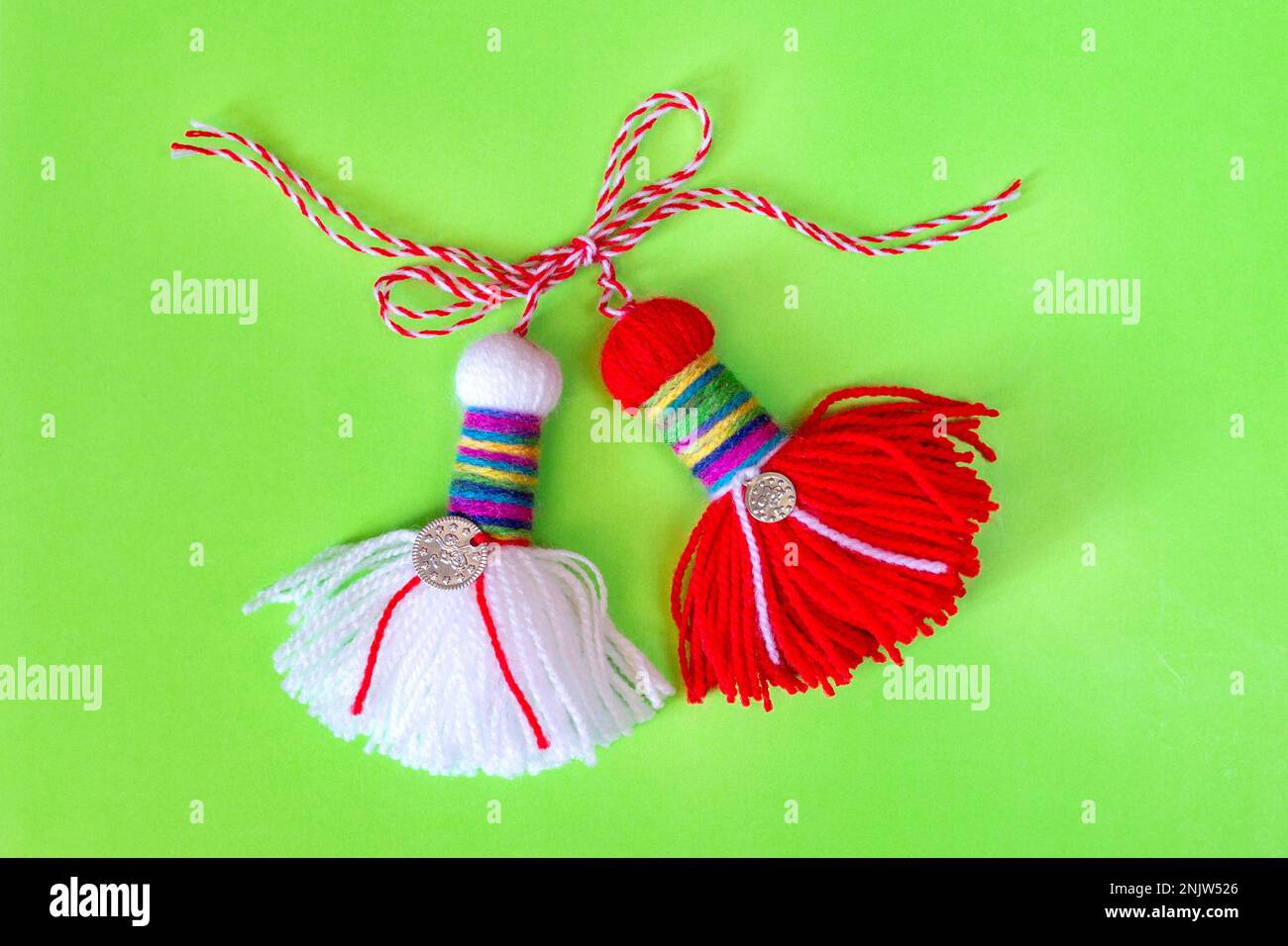 Bulgarian symbol of spring white and red martenitsa on green background ...