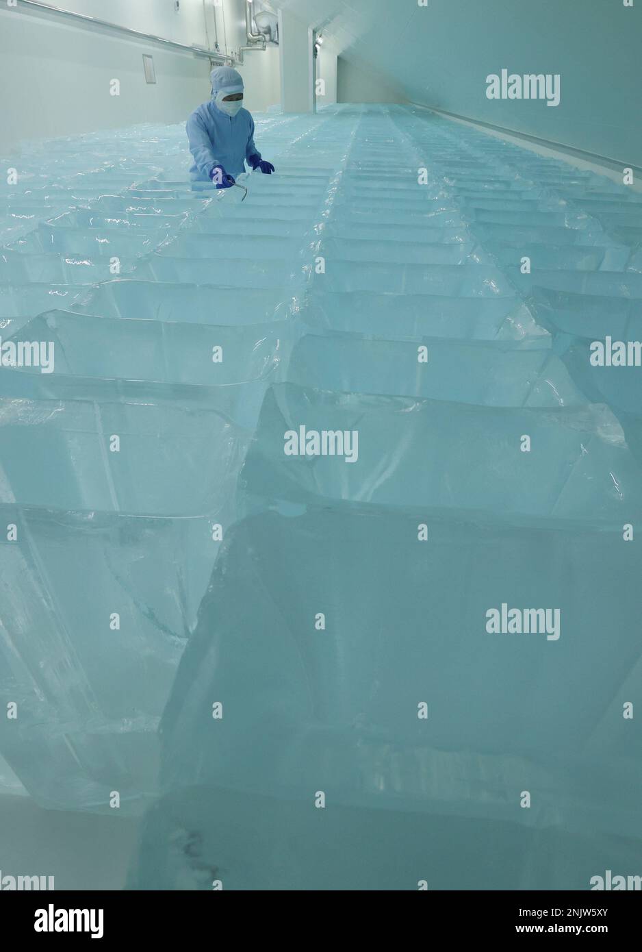 Production of ice is peaking at Honda Reizo Co., an ice manufacturing ...