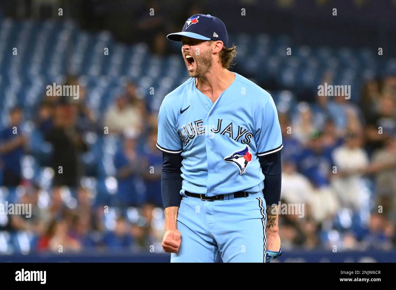 Toronto Blue Jays relief pitcher Adam Cimber reacts after the Jays ...