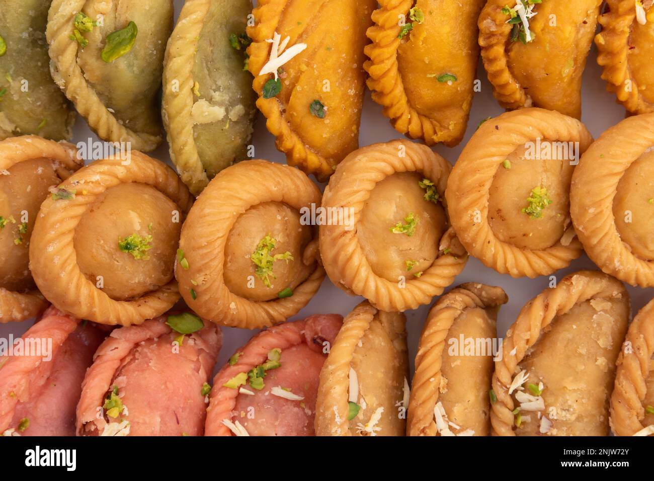 Various Indian Sweet Dumpling Mithai - Rose Gujiya, Karanji ...