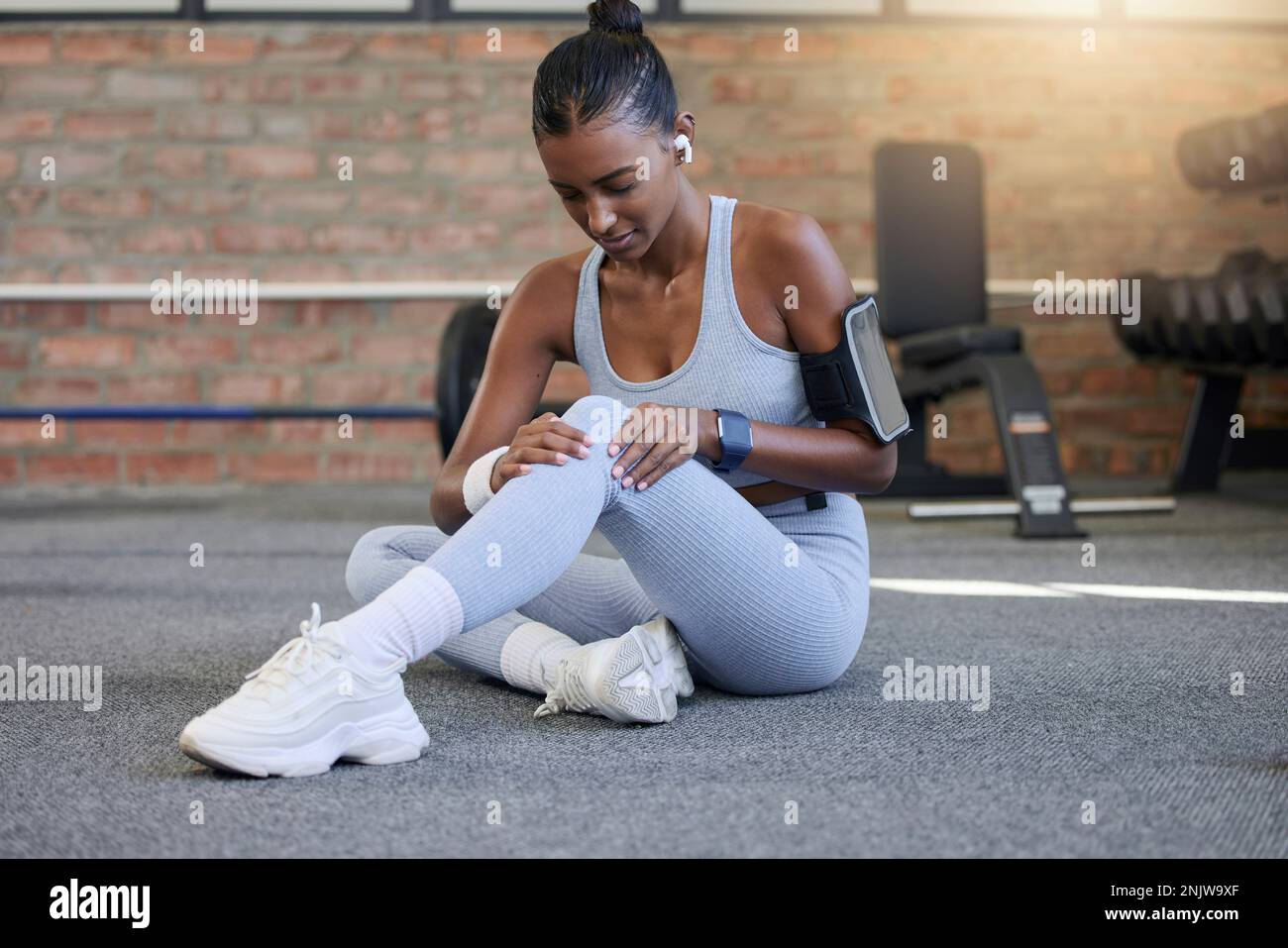 Fitness, injury or sports woman with knee pain after exercising, body ...