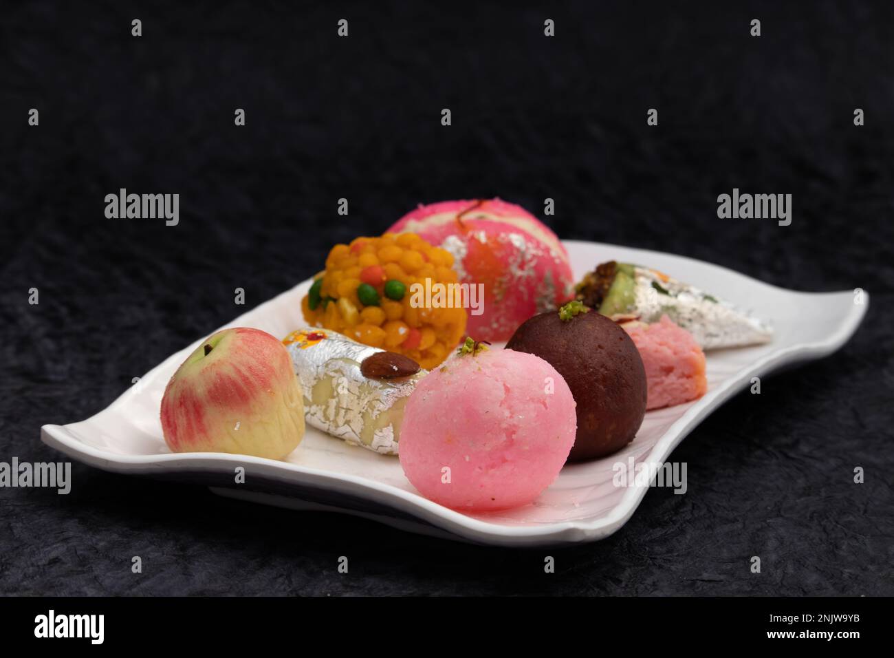 Variety Of Assorted Desi Ghee Indian Mithai viz. Laddu, Kesar Barfi ...