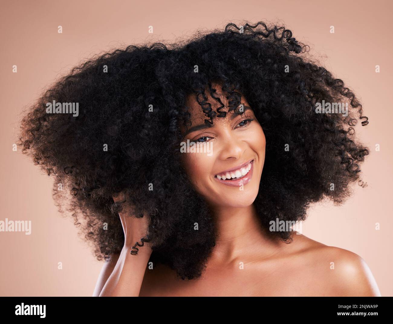 Hair care, black woman and curly texture of a young model with a ...