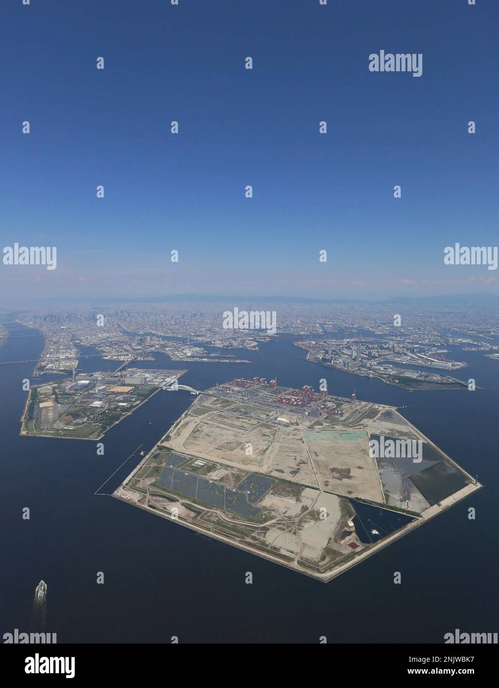 An aerial photo shows an artificial island of Yumeshima, a venue of the ...