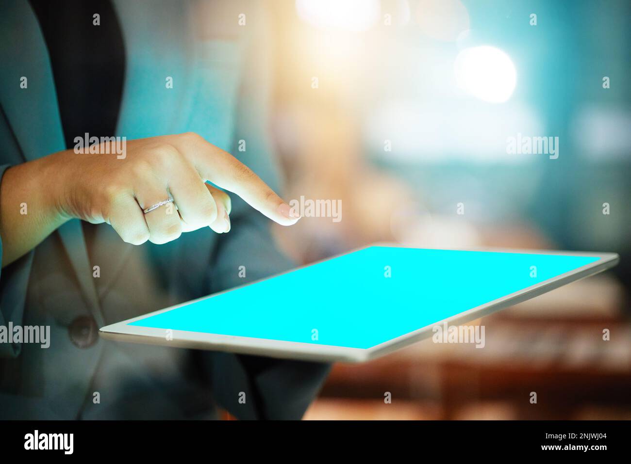 Hands, tablet green screen and office mockup at night for planning, research or web design tech ...