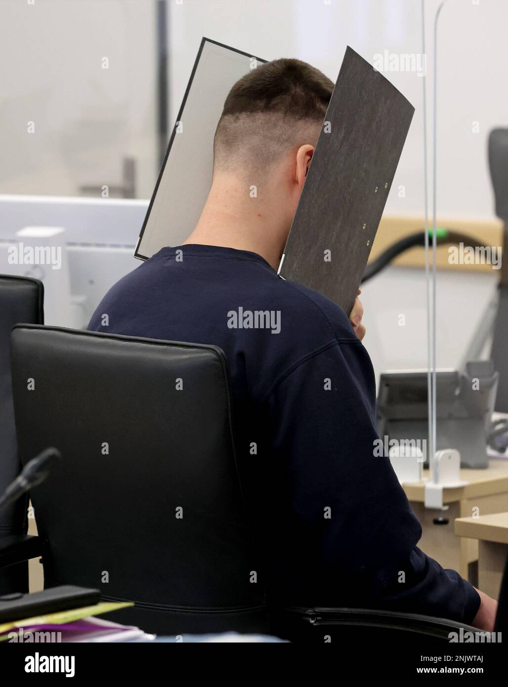 Rostock, Germany. 23rd Feb, 2023. The defendant in the triple murder ...