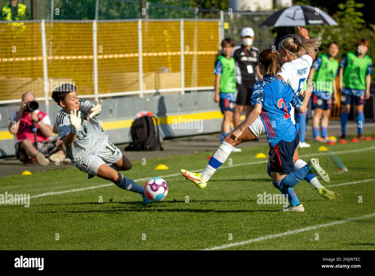 Emma Koivisto of Finland tries to score against goalkeeper Ayaka ...