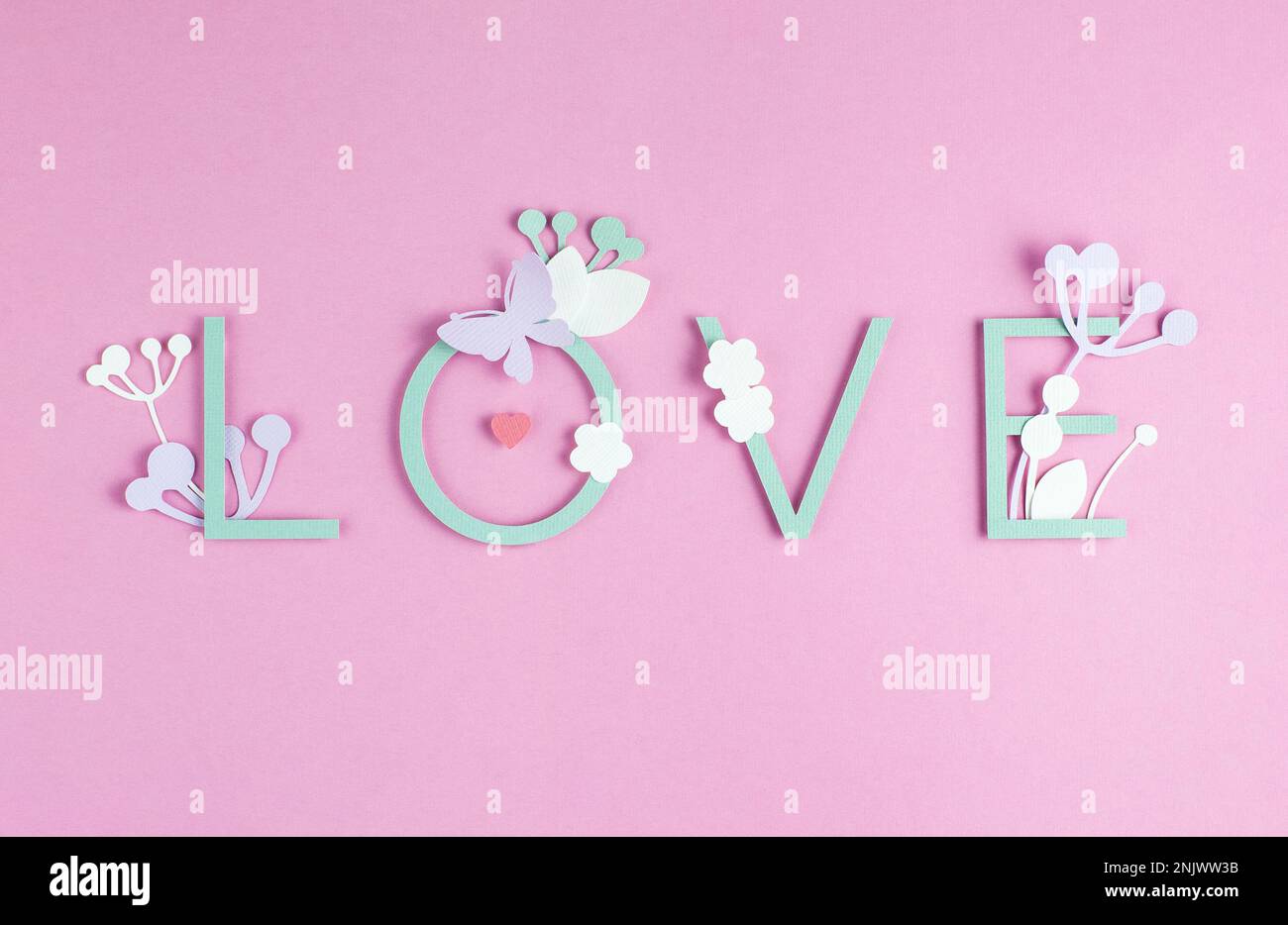Romantic composition in pastel colors with lettering Love, paper ...