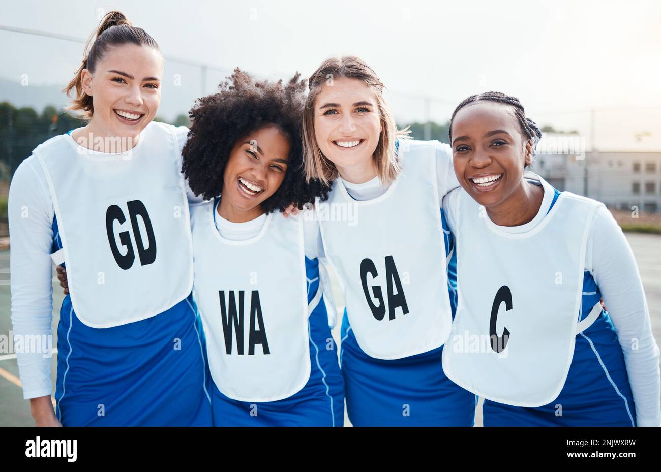 Netball, team and friends in portrait, women on outdoor court and smile ...