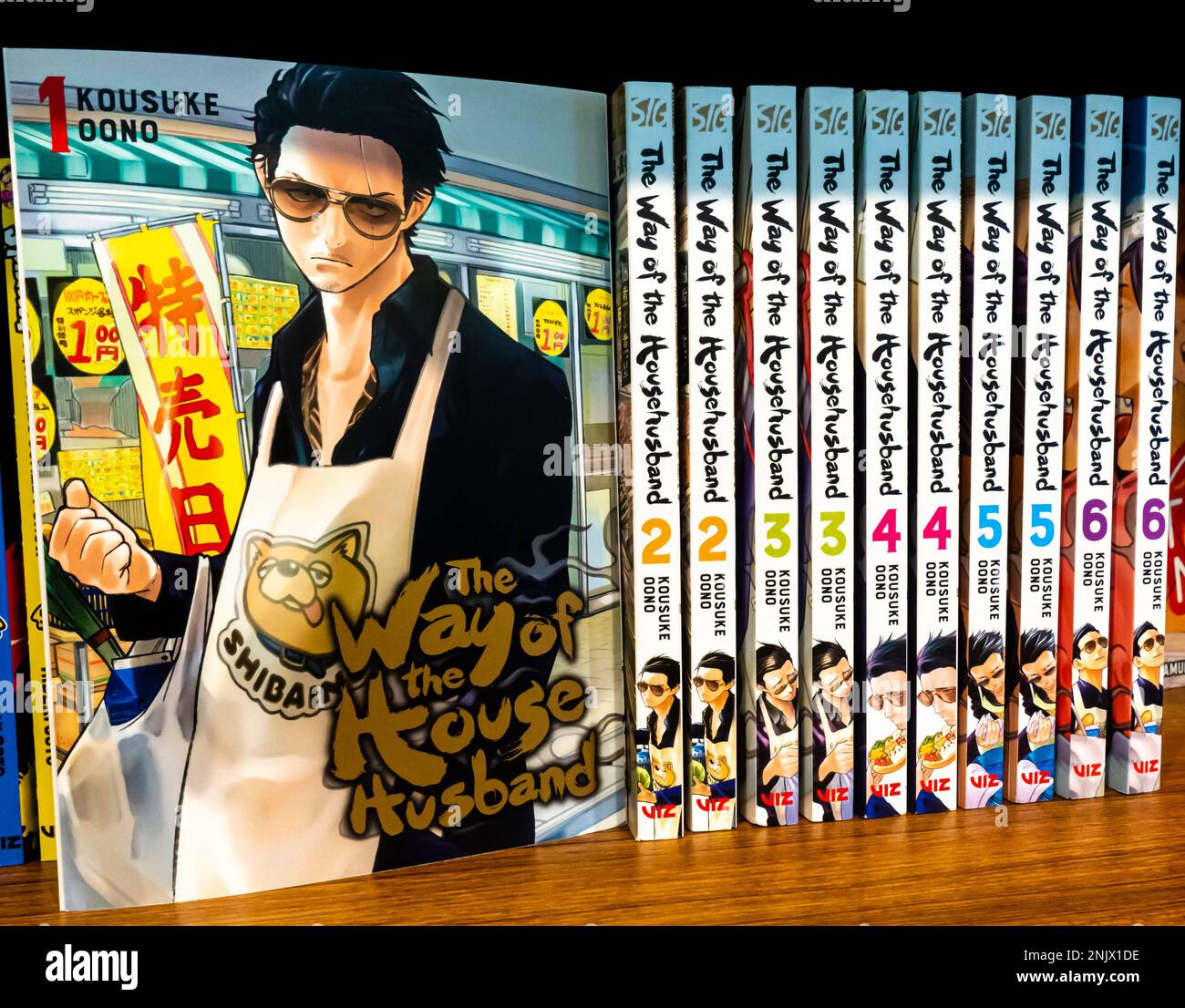 The Way of the Husband Manga series books on a shelf. Kousuke Oono ...