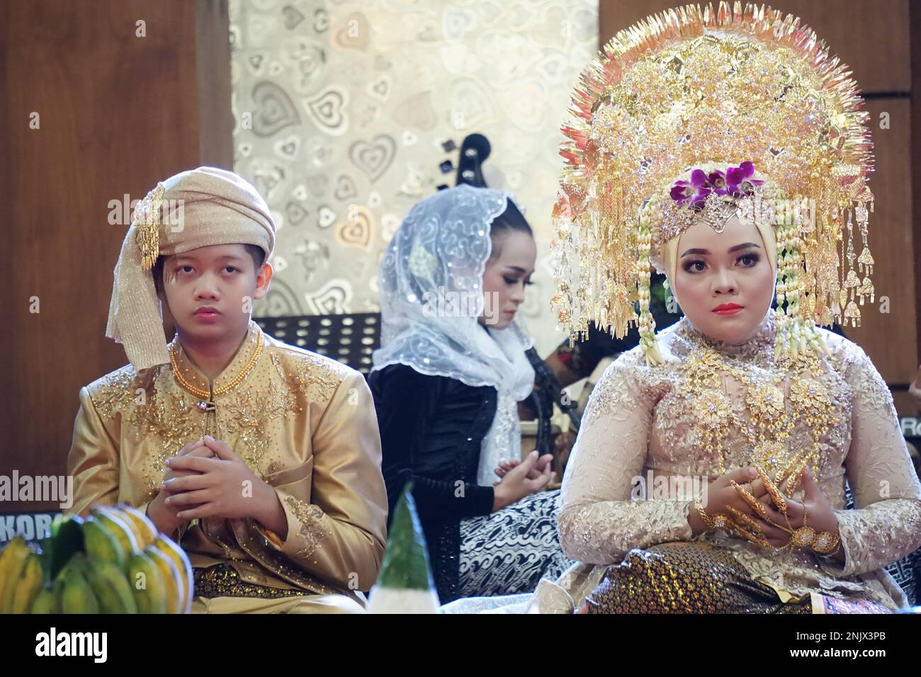 Indonesian with a traditional Minangkabau clothes on 1800 chocolate ...