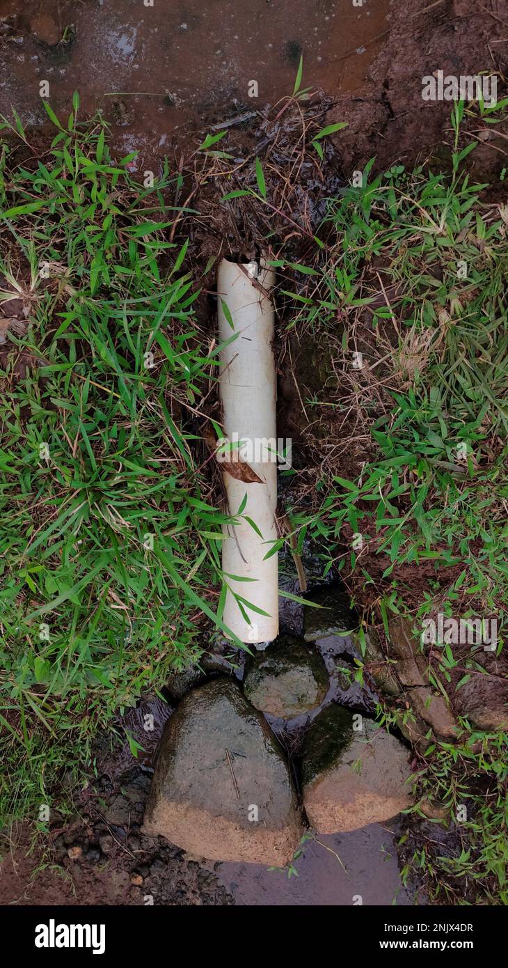 Photos of farmer's simple water disposal, day time . Made using simple ...