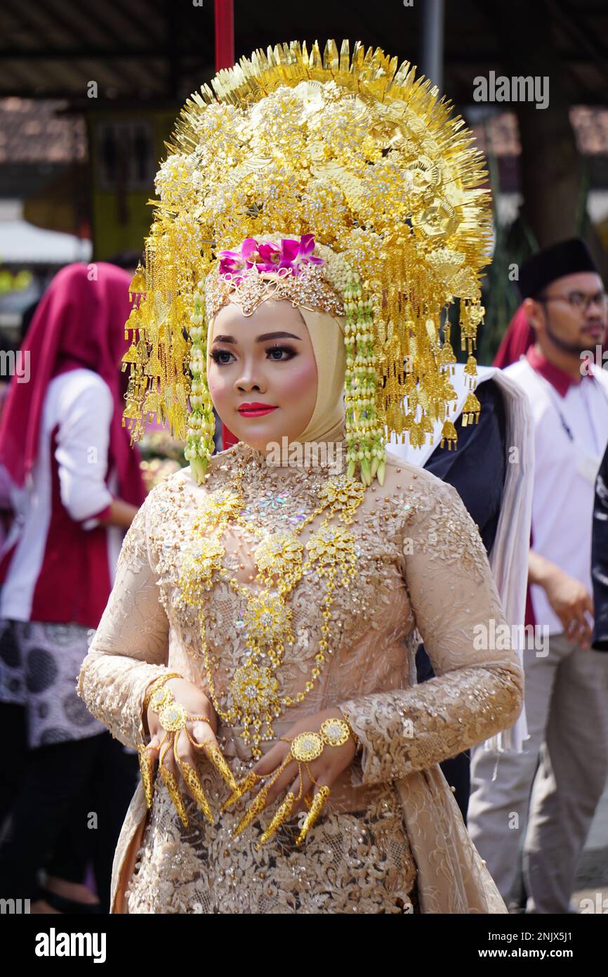 Indonesian with a traditional Minangkabau clothes on 1800 chocolate ...