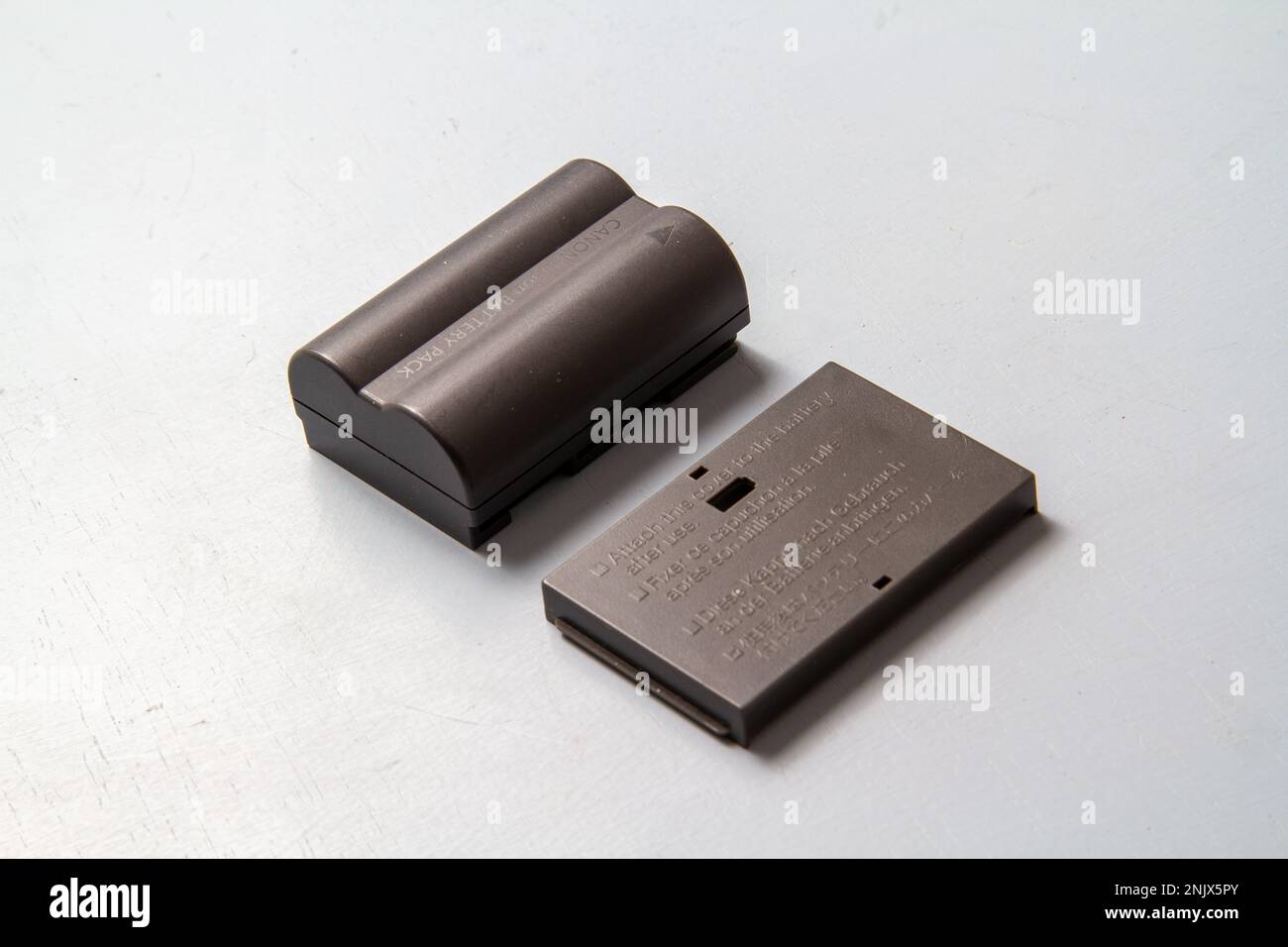 Grey plastic case rechargeable Lithium battery for a Canon digital ...