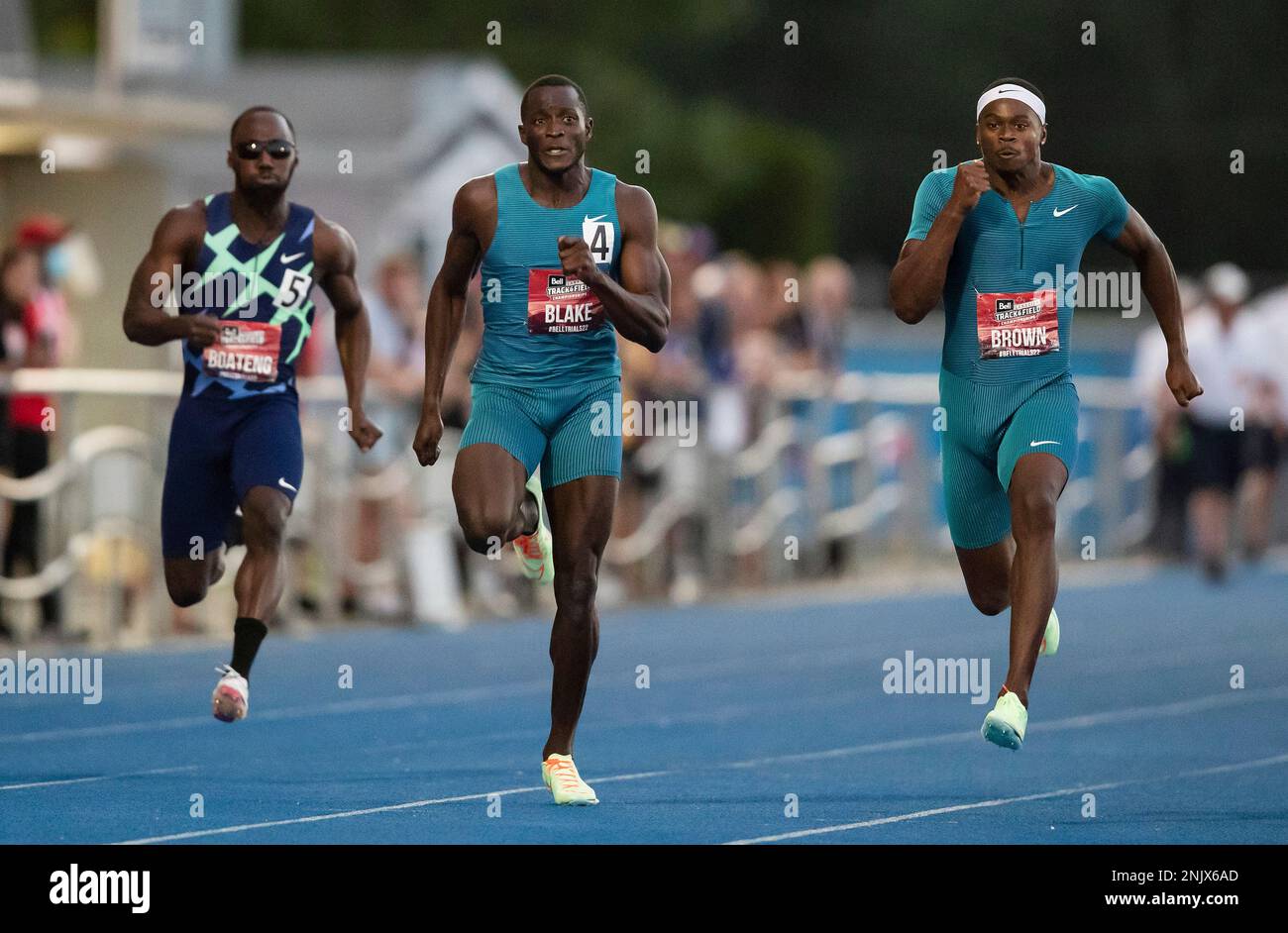 Aaron Brown, right, races to the win ahead of Jerome Blake, center, who ...