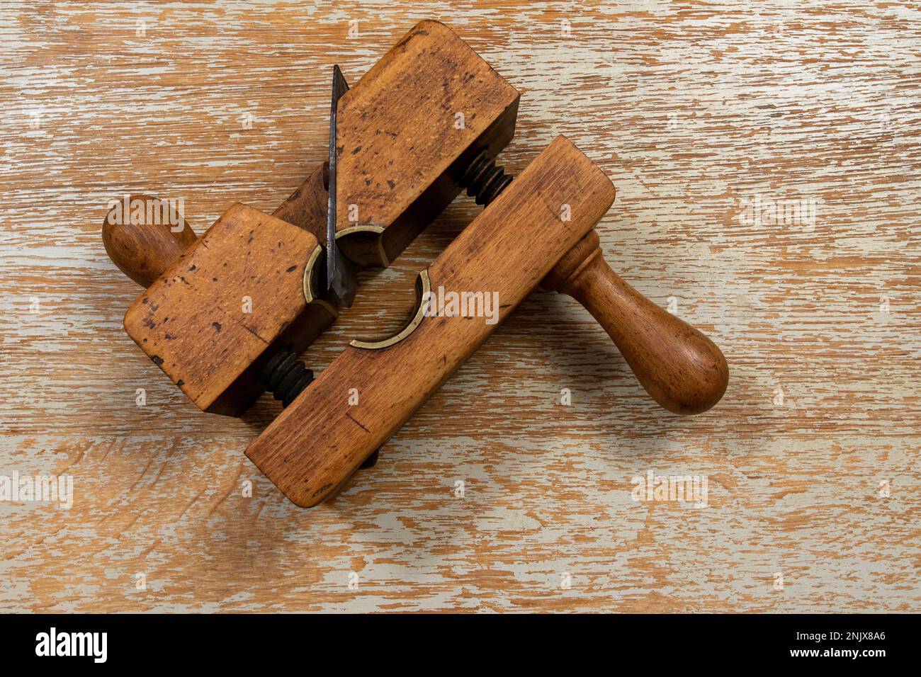 This vintage carpenter's tool is for planing a conical section ...