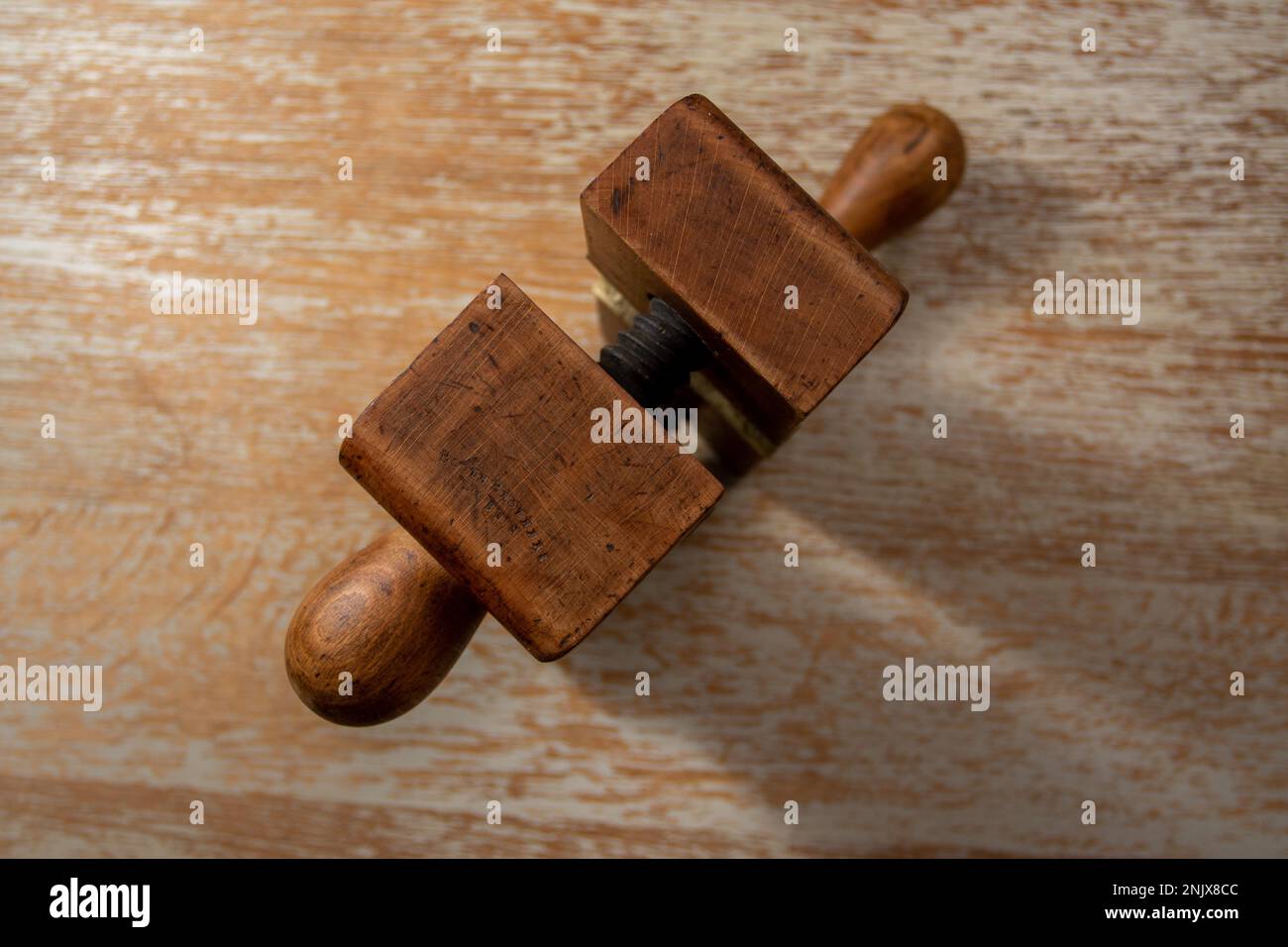 This vintage carpenter's tool is for planing a conical section ...