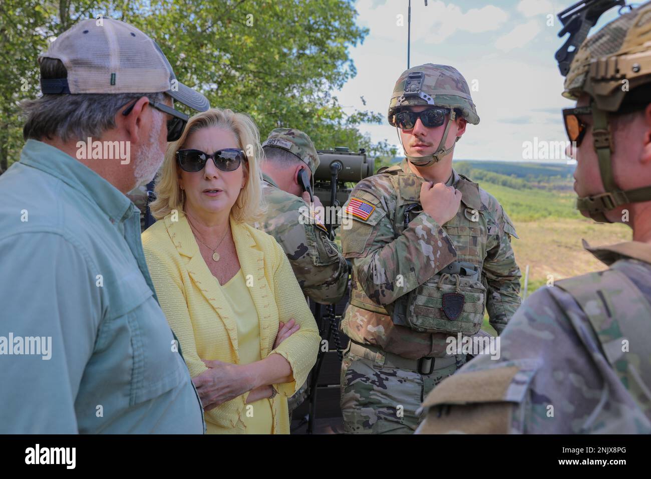 From left, Senator Gary Peters (D-MI), the Honorable Christine Wormuth ...