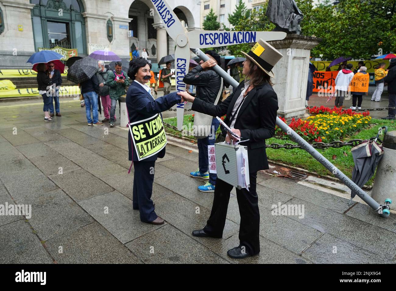 Several people in costume during a march to protest against the ...