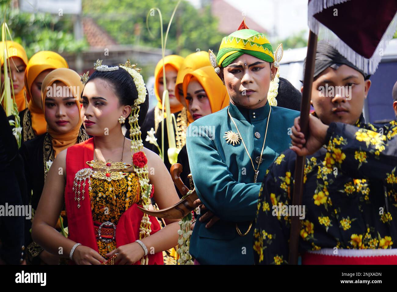 Indonesian with a traditional javanese cloth on 1800 chocolate ketupat ...