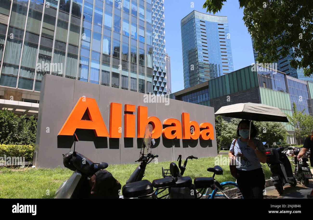 A signboard of Alibaba Group Holding Limited is seen in Beijing, China ...