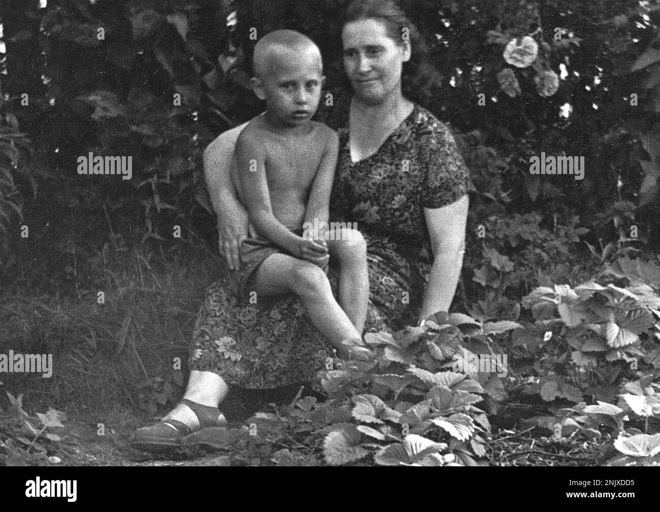 VLADIMIR PUTIN, President of Russia, aged 5 in July 1958, with his ...