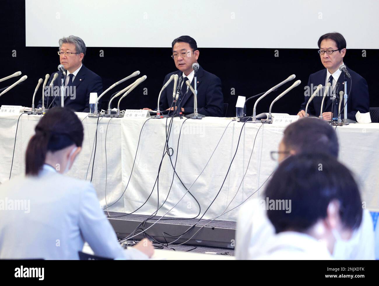 Yuichiro Kondo, President of SMBC Nikko Securities, (C) attends a press ...