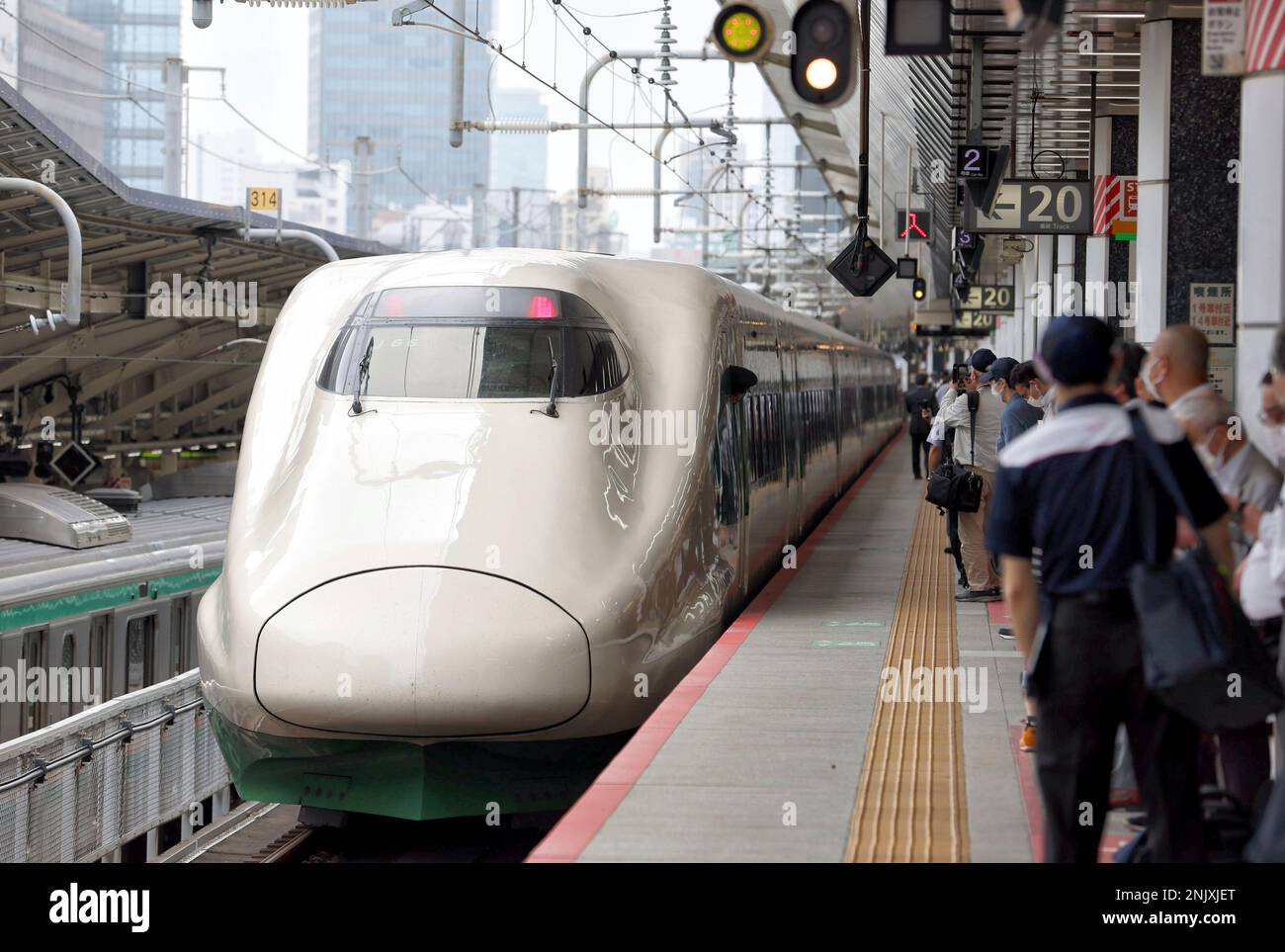 Tohoku Shinkansen bullet train painted with the design of the first ...