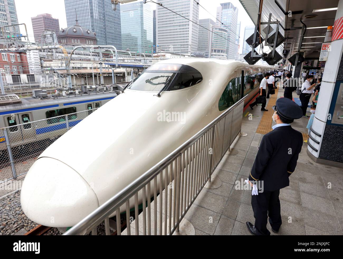 Tohoku Shinkansen bullet train painted with the design of the first ...
