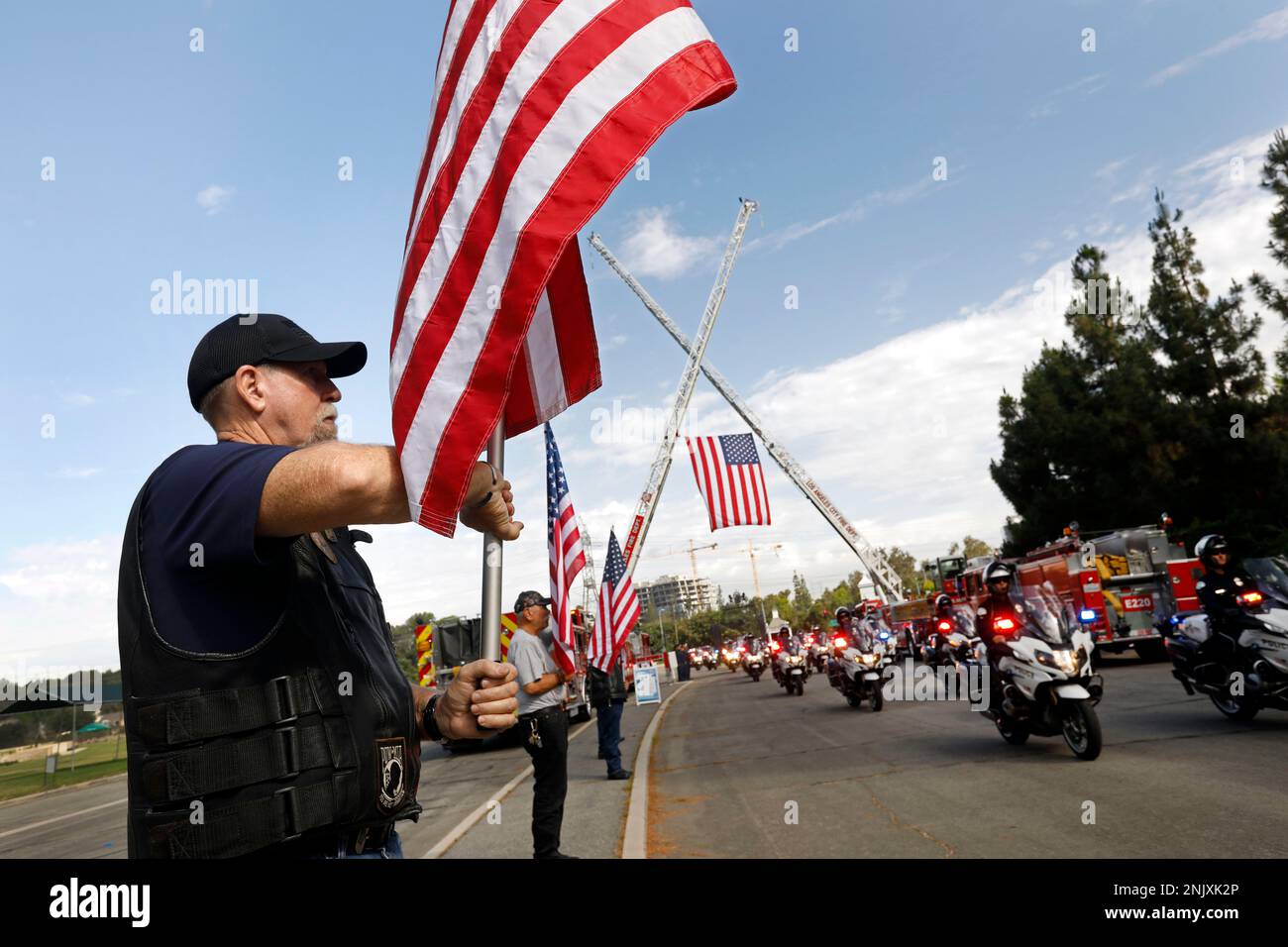 Tom Parry, of Huntington Beach, left, and other members of the Patriot ...