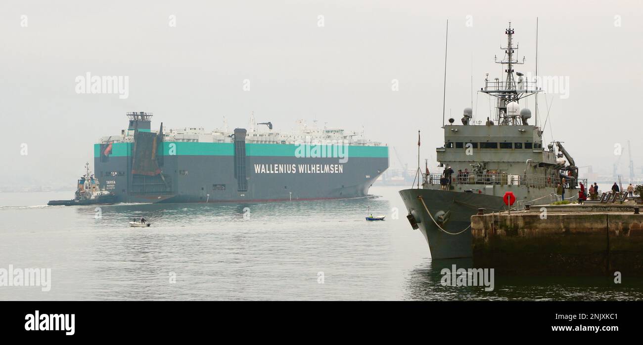 Tarifa vehicle carrier ship pushed by a tugboat passing the Spanish ...