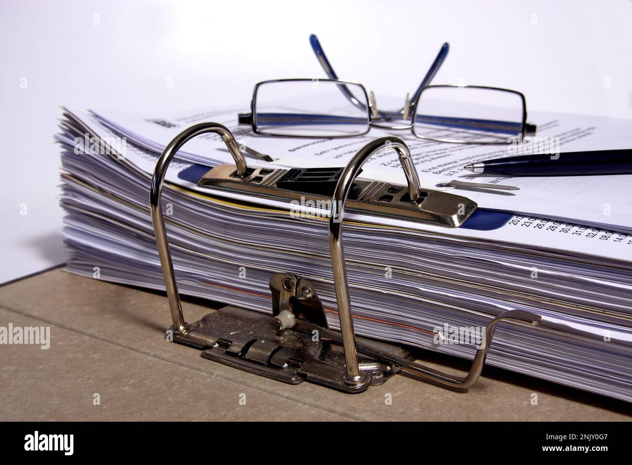open filing folder with ballpen and spectacles Stock Photo - Alamy