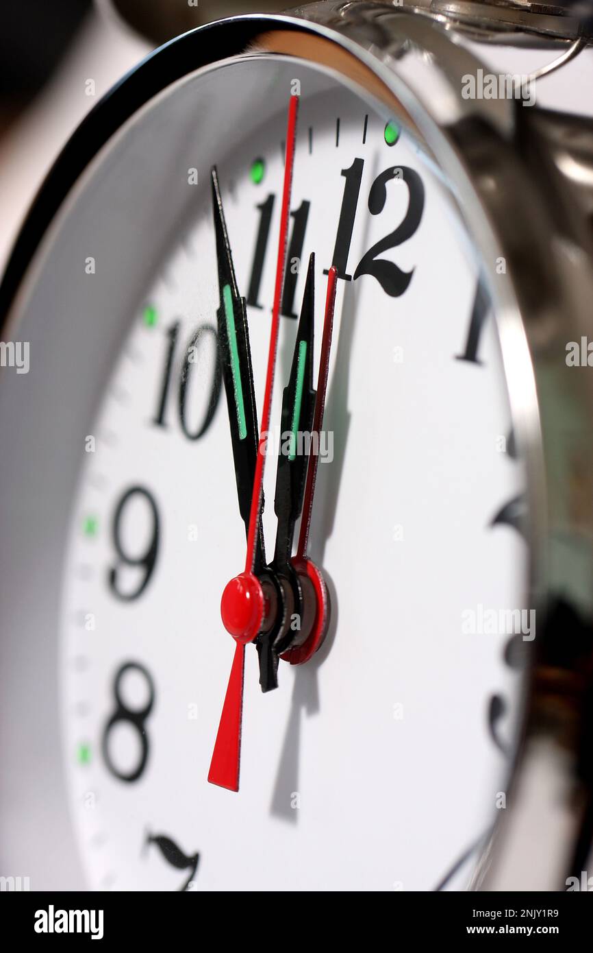 old alarm clock, 5 before 12 Stock Photo - Alamy