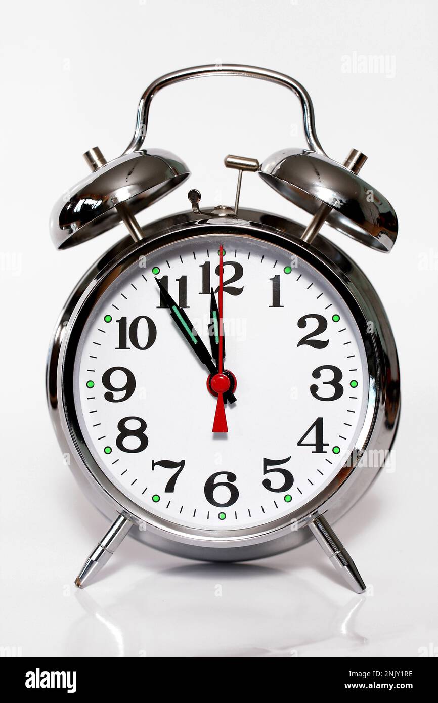 old alarm clock, 5 before 12 Stock Photo - Alamy